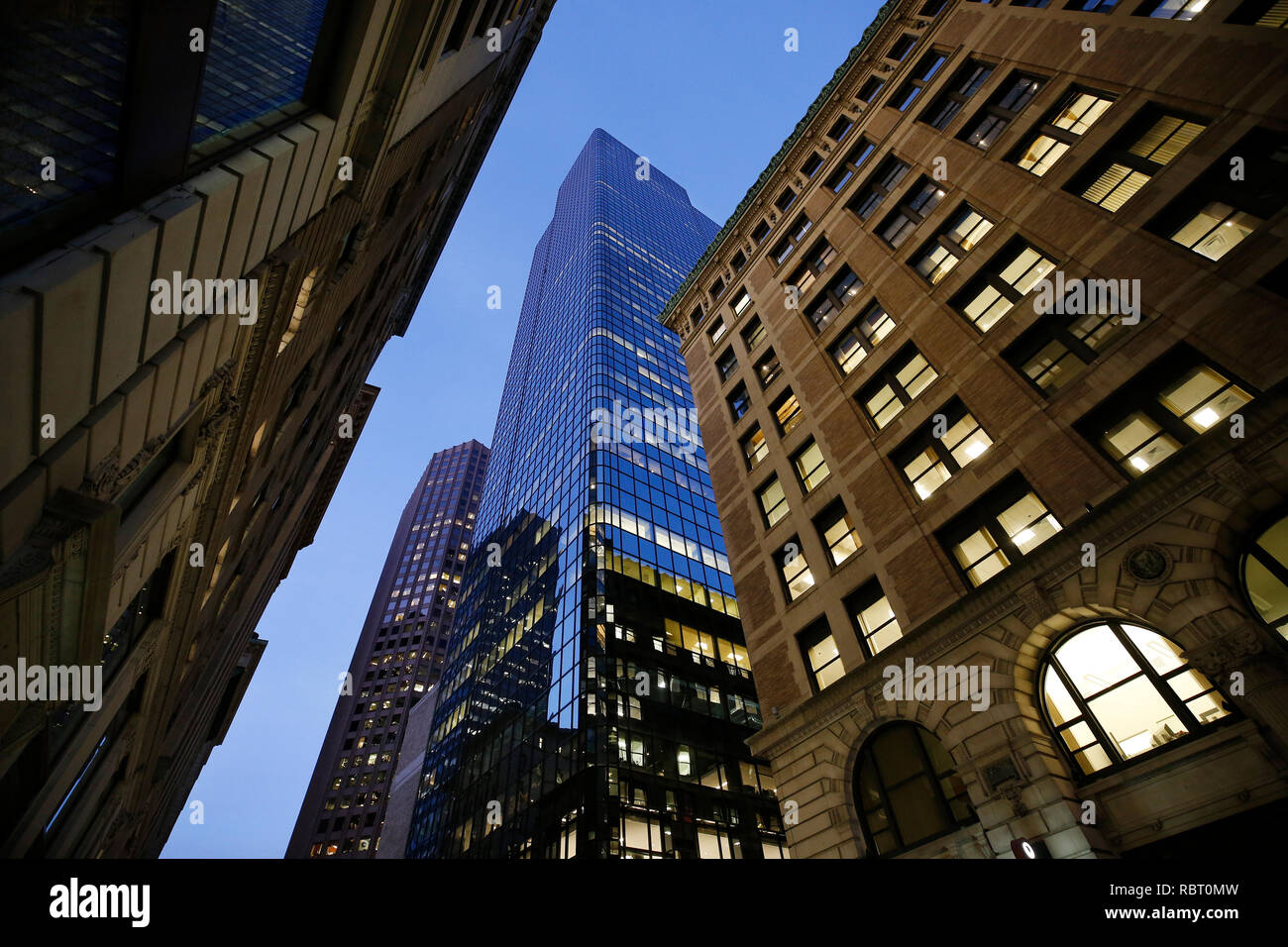 Downtown Boston office buildings from street level, dusk, blue hour ...