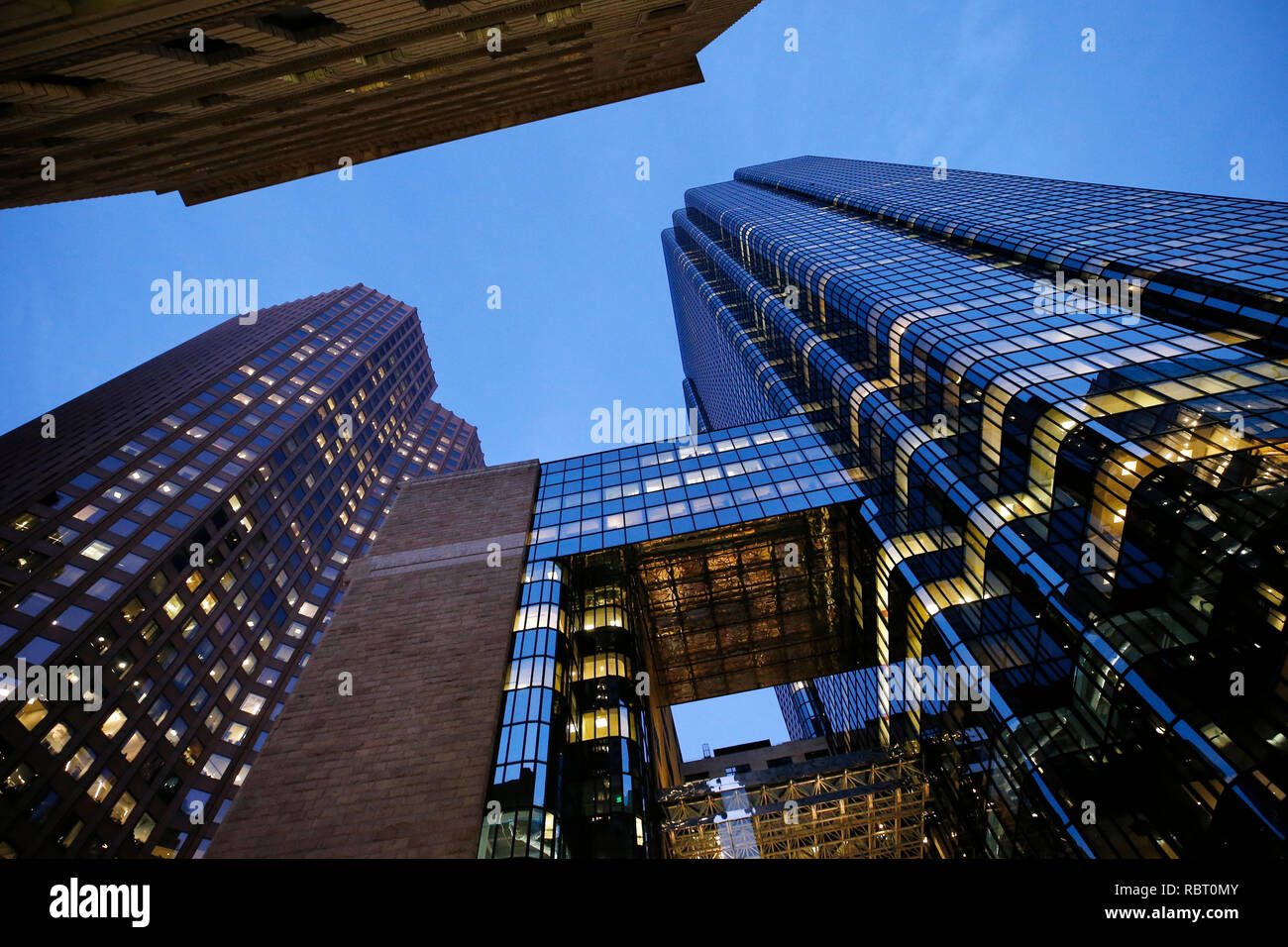 Downtown Boston office buildings from street level, dusk, blue hour ...
