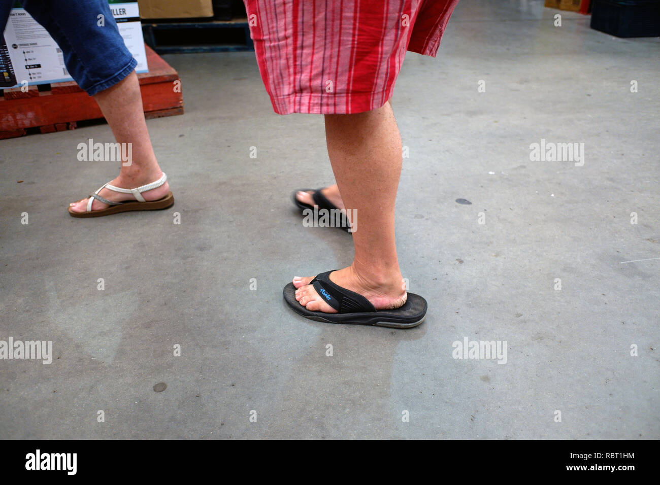 FOOT WEAR AND FEET Stock Photo - Alamy