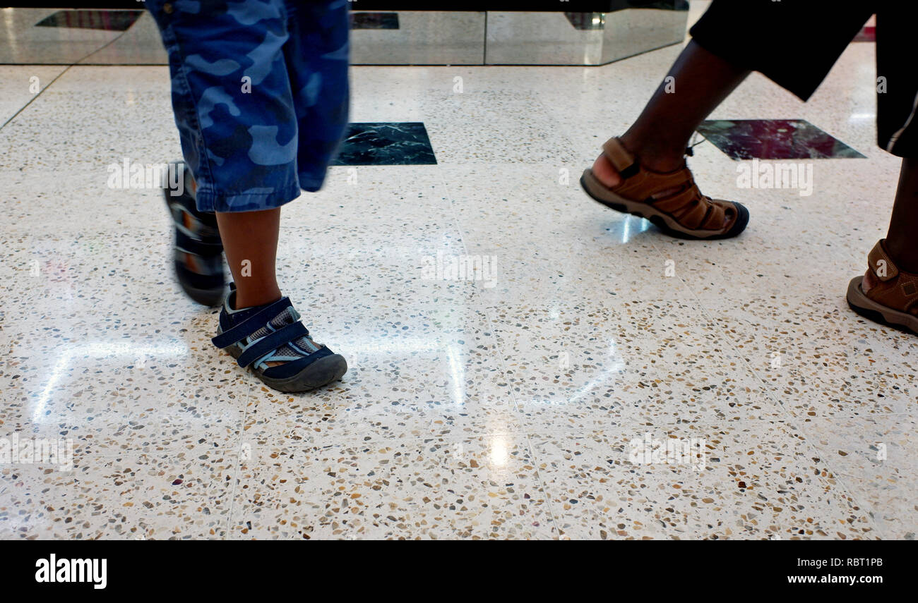 FOOT WEAR AND FEET Stock Photo - Alamy