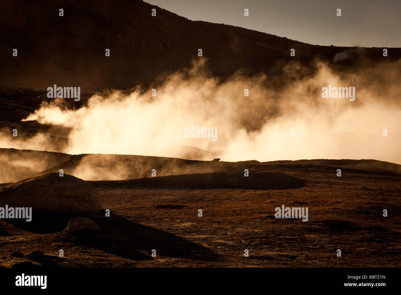 Steam rises from a fumarole as geothermal activity under the ground is ...