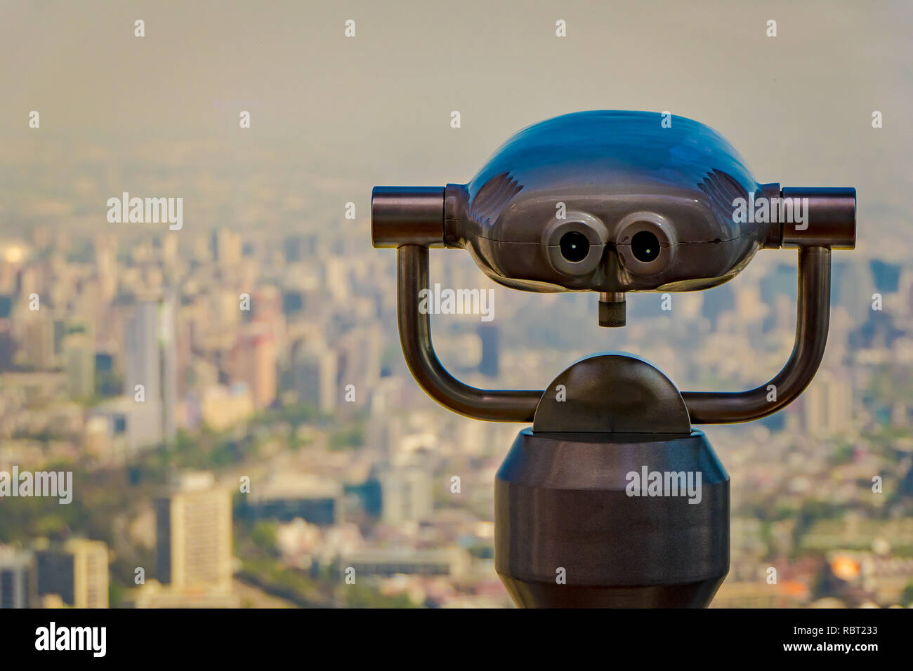 SANTIAGO, CHILE - OCTOBER 16, 2018: Close up of coin viewer machine ...