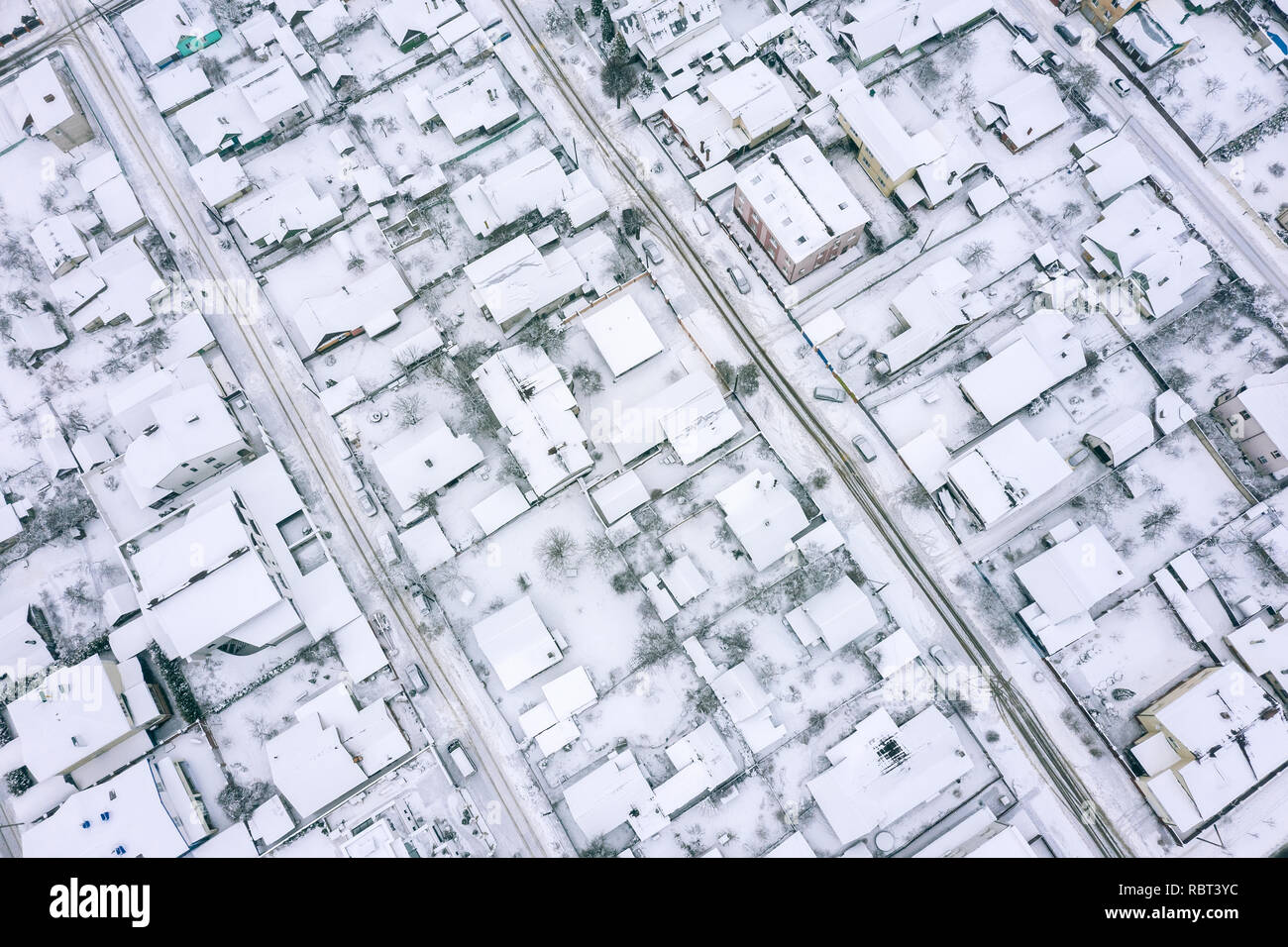 aerial view of rooftops under snow. winter urban background Stock Photo ...