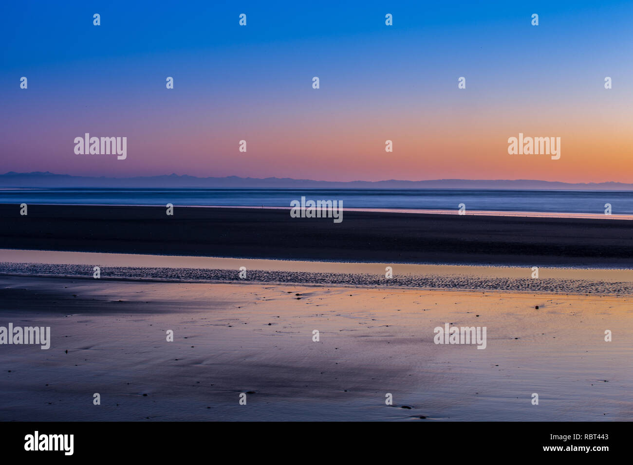 Beach at Dawn Stock Photo - Alamy