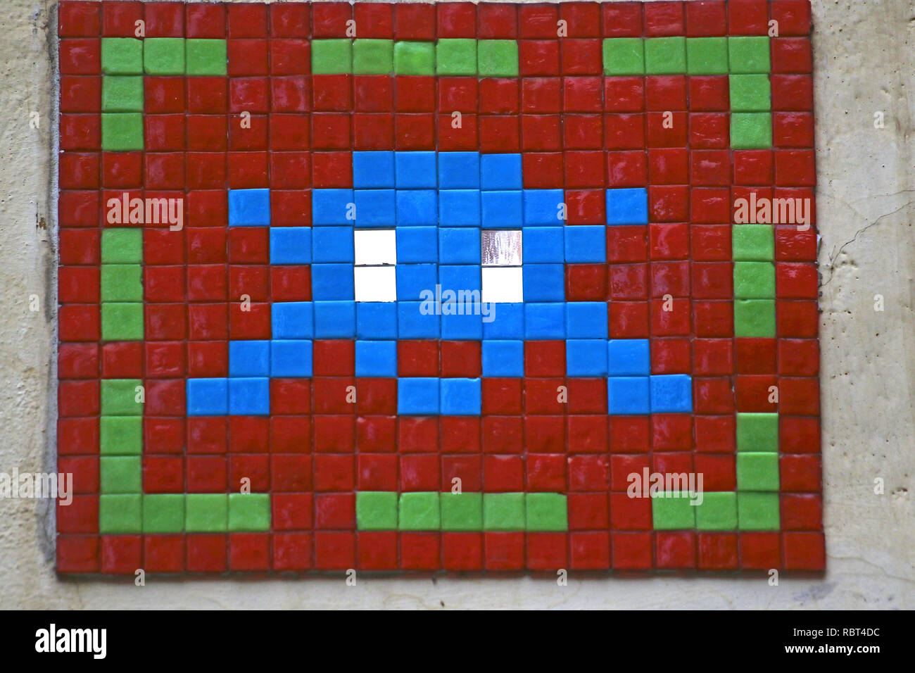 Invader art or space invader art street mosaic on a wall in Rome quite ...
