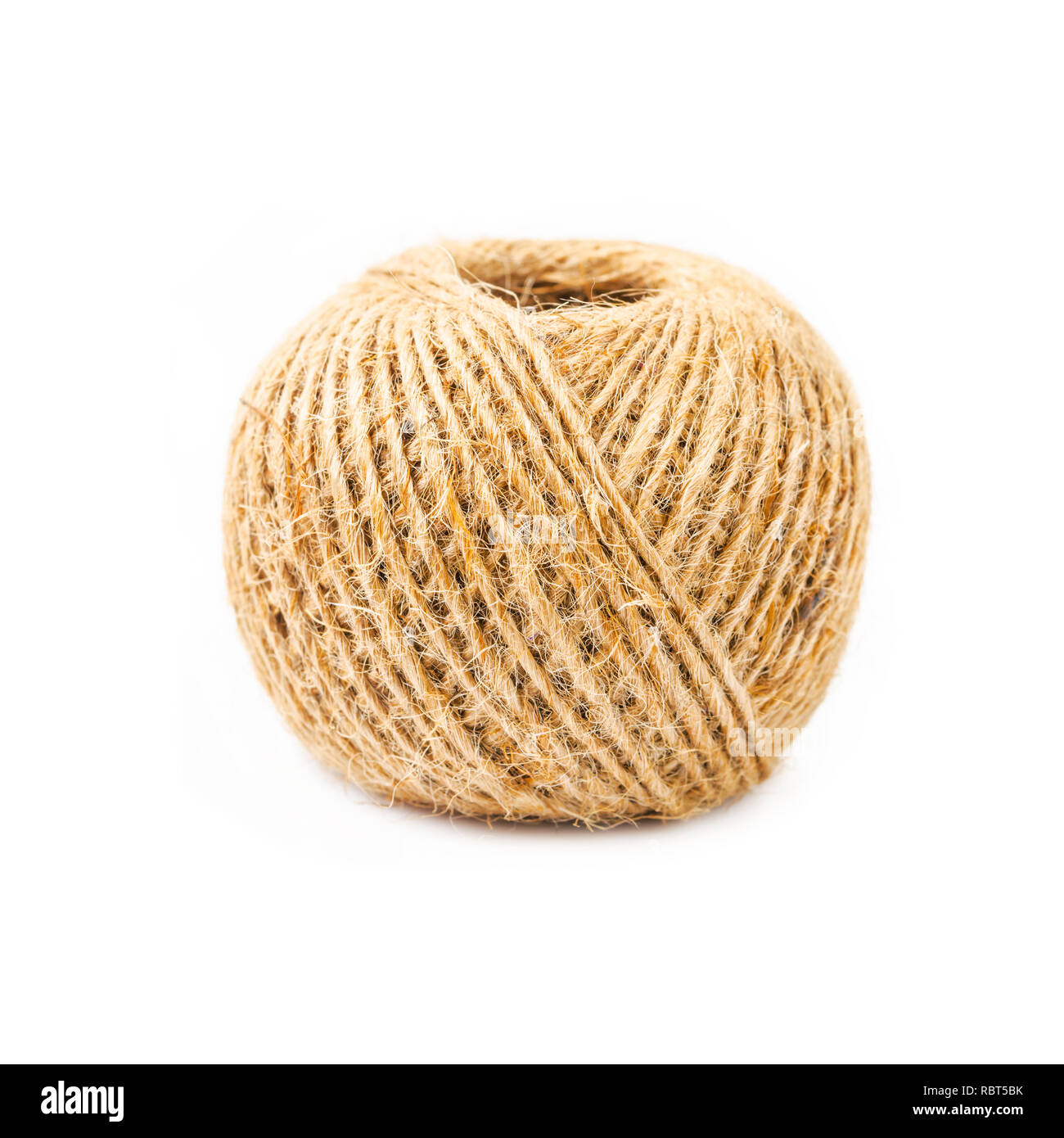 Hemp rope roll isolated on white background Stock Photo - Alamy