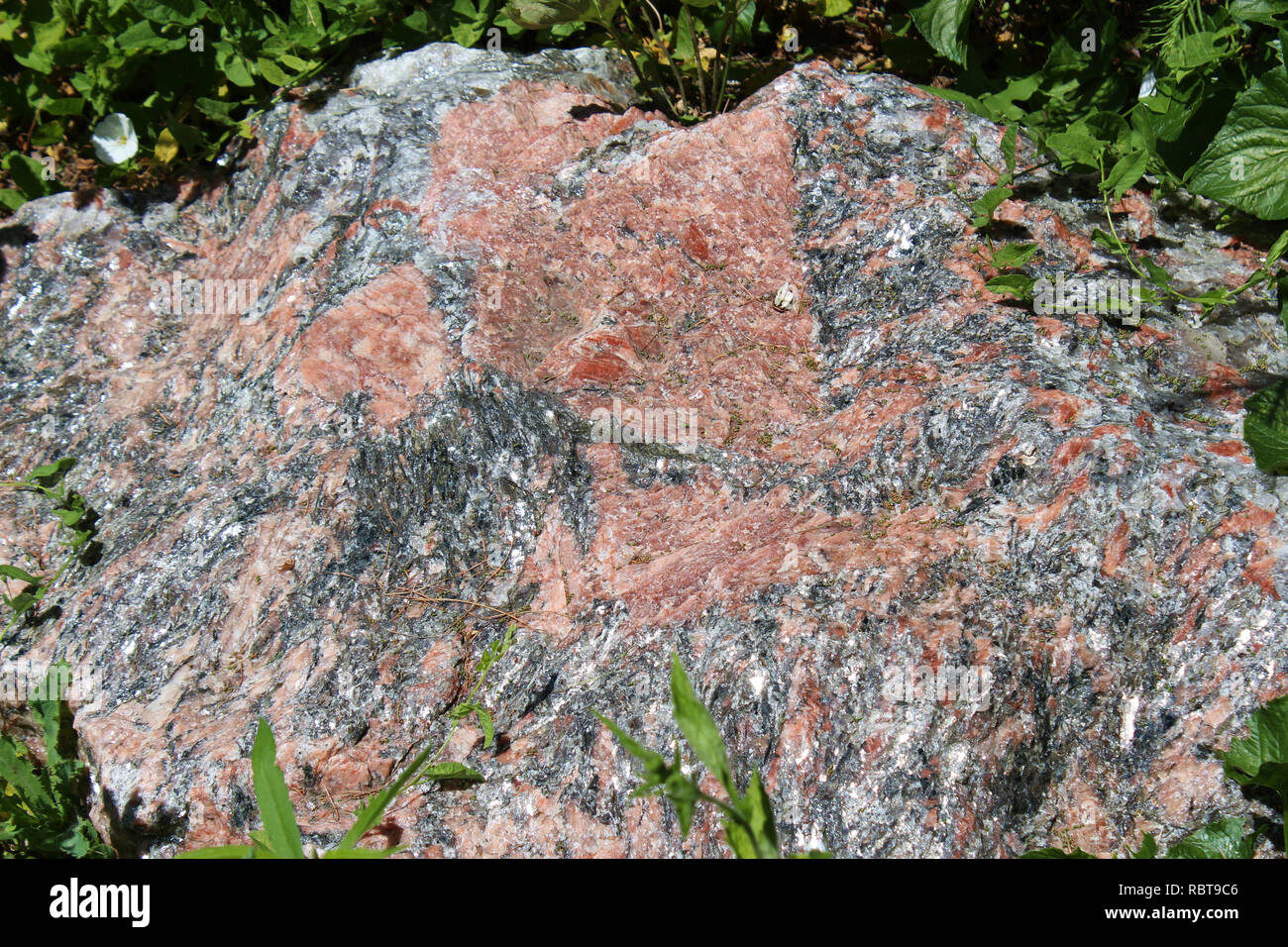 A large rock composed of a mix of feldspar, quartz and granite Stock ...