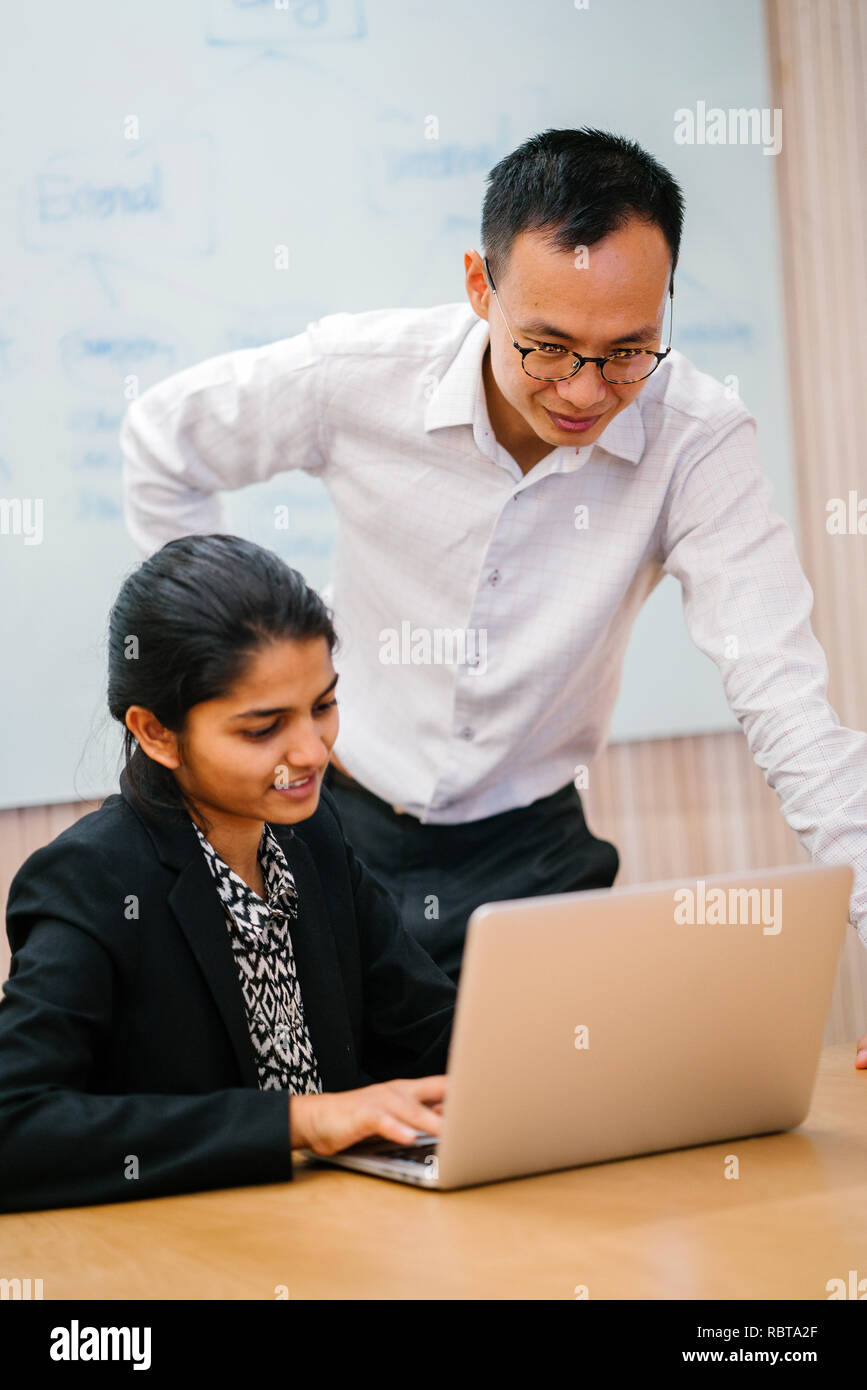 Asian man teacher whiteboard hi-res stock photography and images - Alamy
