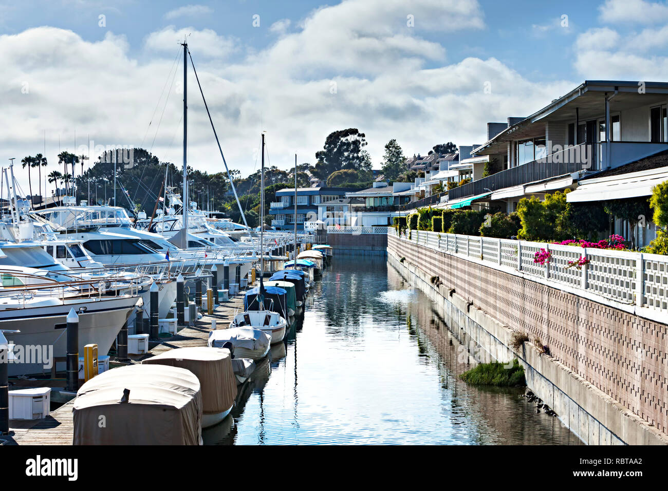 Canals, Seawall & Boats in marina Stock Photo - Alamy