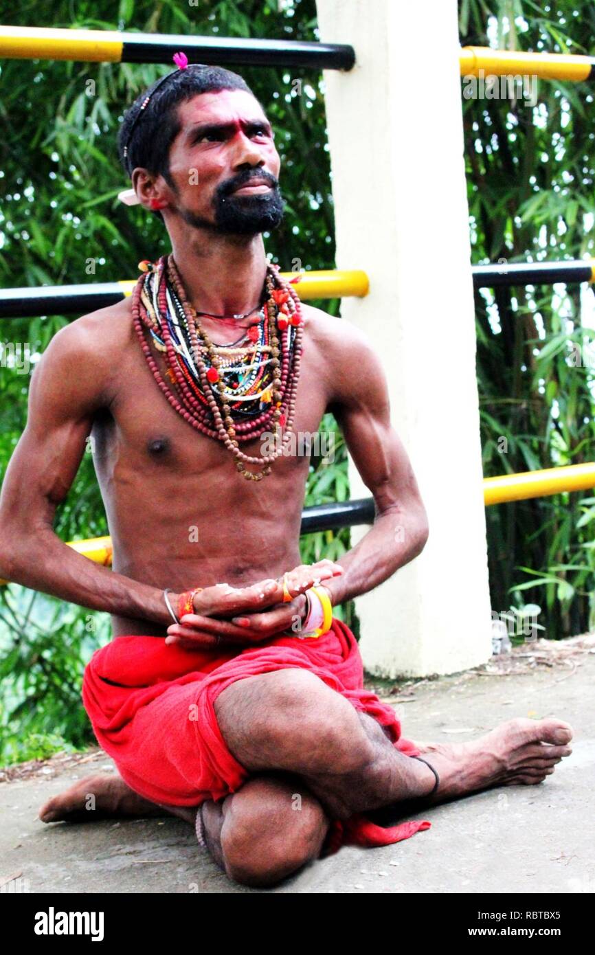 A Saint praying lord Siva at Ambubasi Mela Stock Photo - Alamy