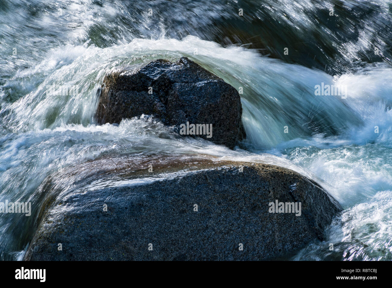 Water Over Rocks in river Stock Photo - Alamy