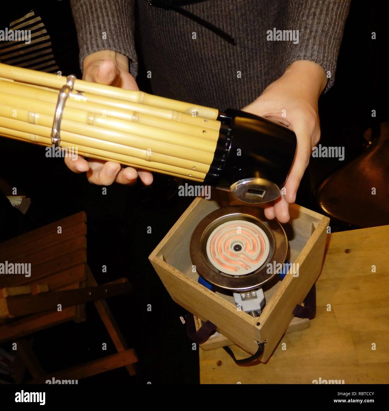 A special portable electrical stove for warming shō (sho) or sheng ...