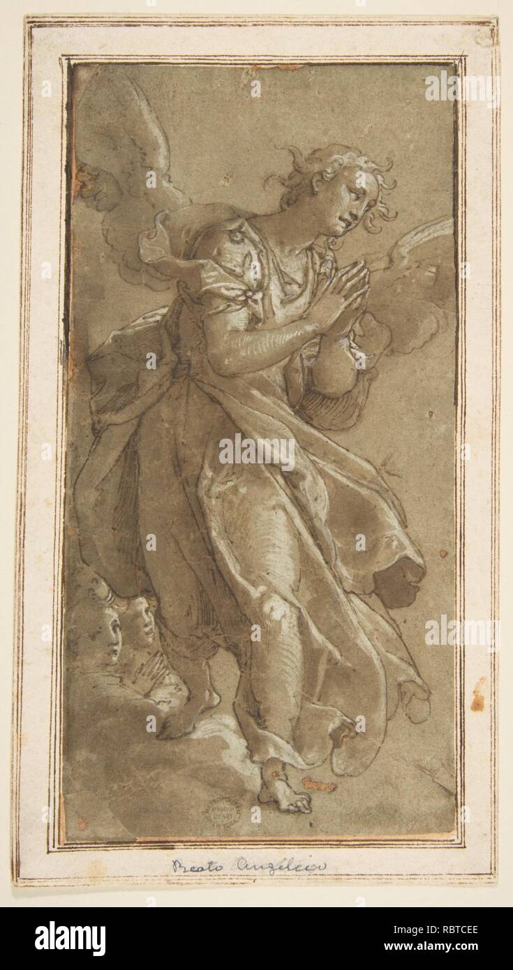 A Standing Angel and two Cherubs Stock Photo - Alamy