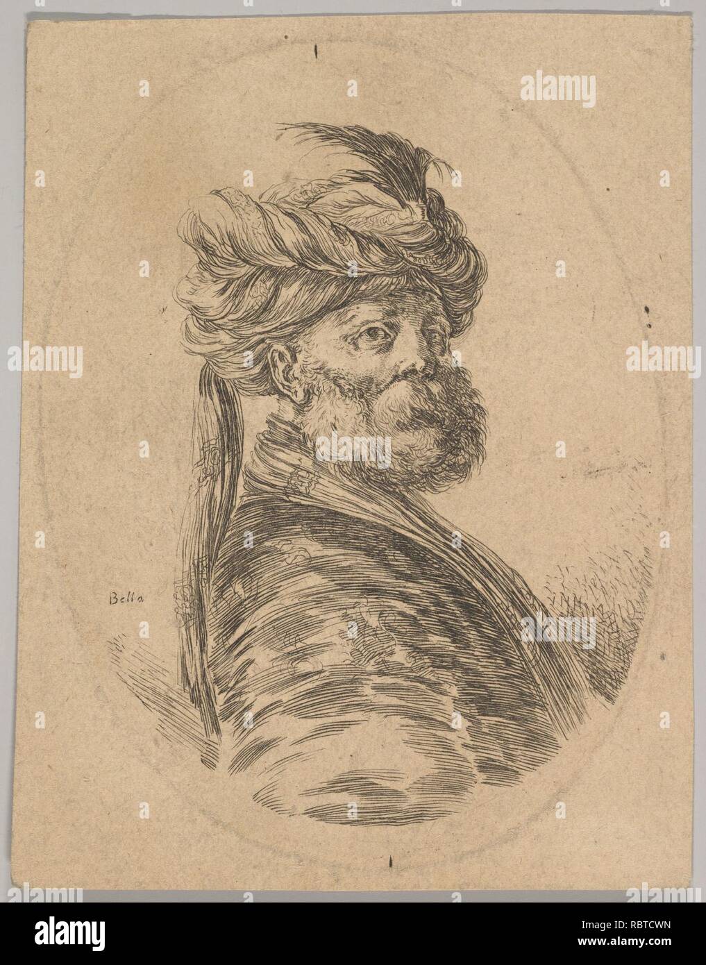 A Turkish man with a beard and turban with one long feather in front ...