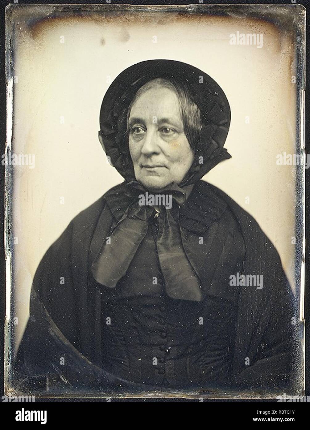 -Elderly Woman in Black Cape and Bonnet with Mourning Crape Stock Photo ...