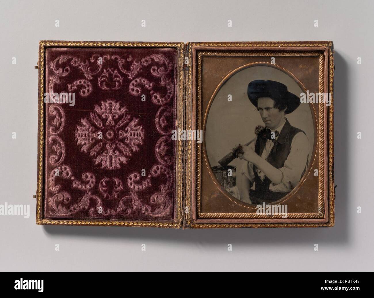 -Painter Dipping Brush into Paint Jug Stock Photo - Alamy