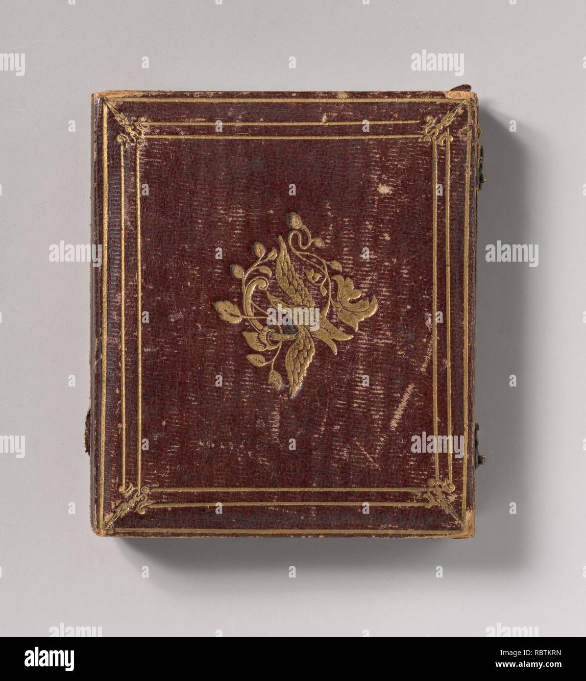 -Seated Young Man Resting Arm on Table Beside Daguerreotype Case Stock ...