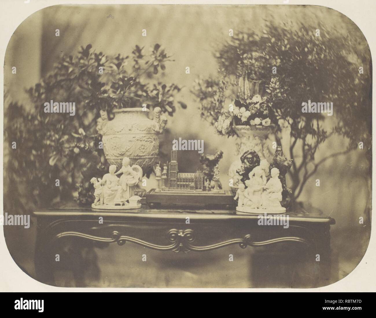 -Table Top Still Life with Model Cathedral and Small Sculptures Stock ...