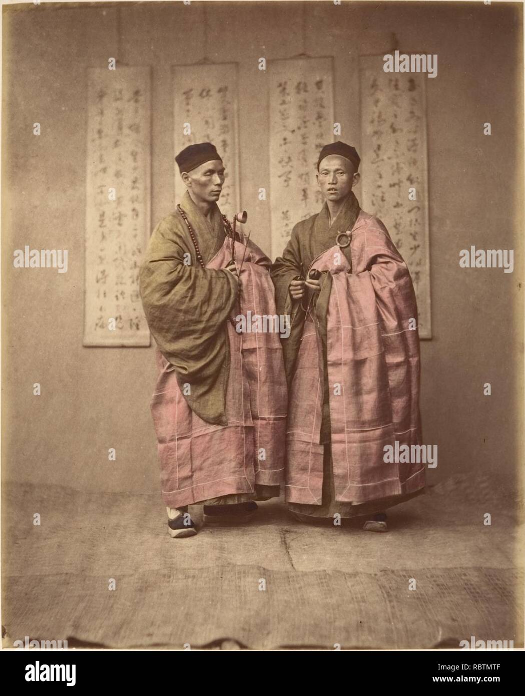 -Two Chinese Men in Matching Traditional Dress Stock Photo - Alamy