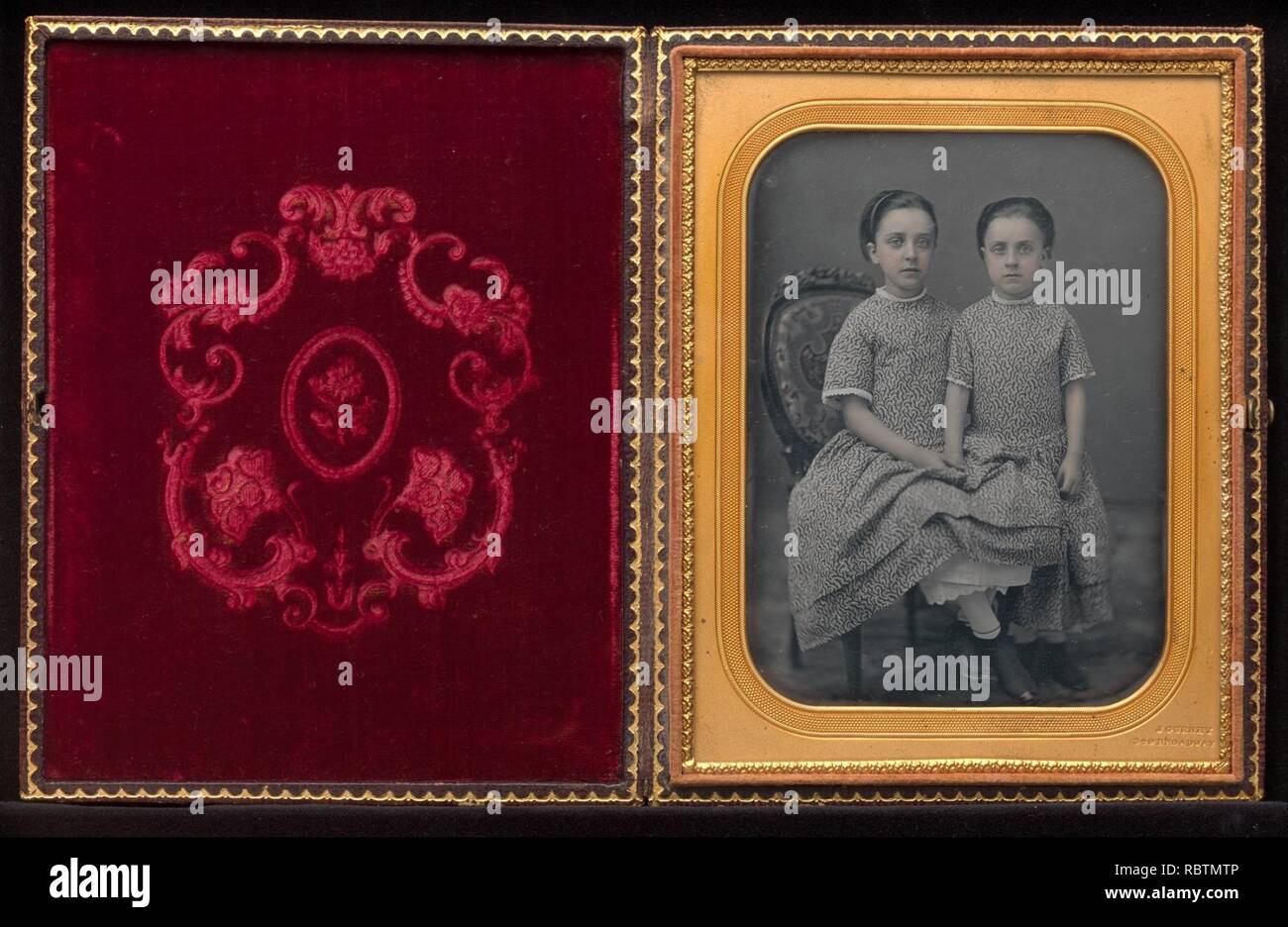 -Two Girls in Identical Dresses Stock Photo - Alamy