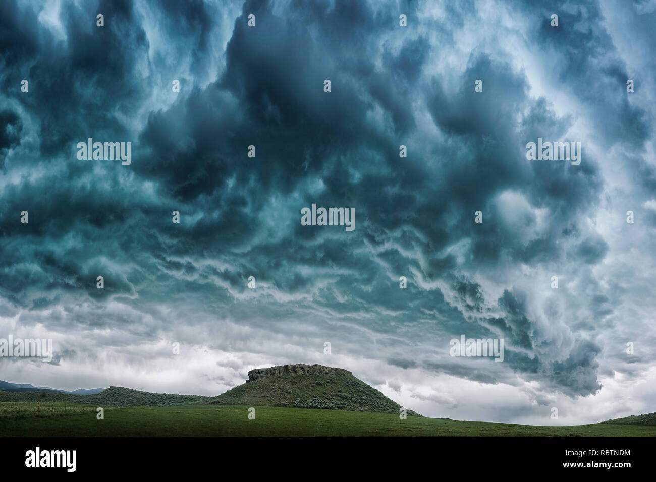 storm over mountain Stock Photo - Alamy