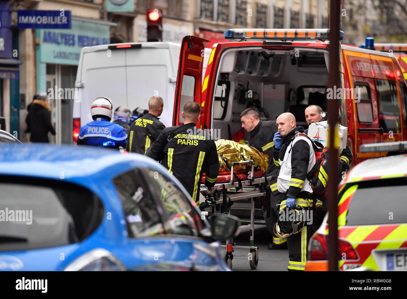 Paris, France. 12th Jan, 2019. Firefighters work at a blast site in ...