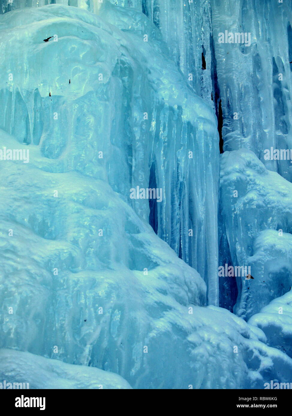Blue ice from waterfall Stock Photo - Alamy