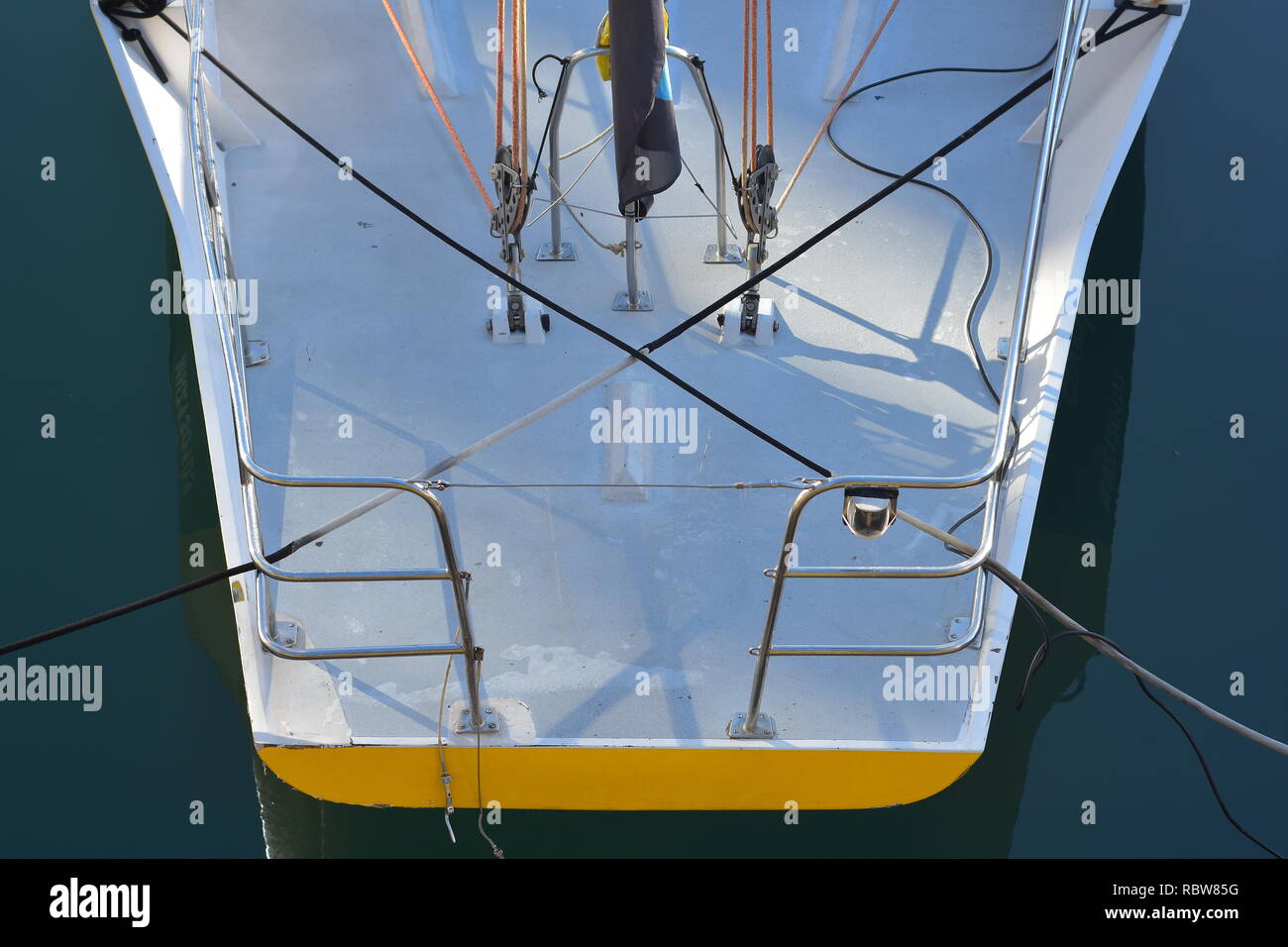 Stern of composite racing sailing ship with stainless steel pushpit and ...