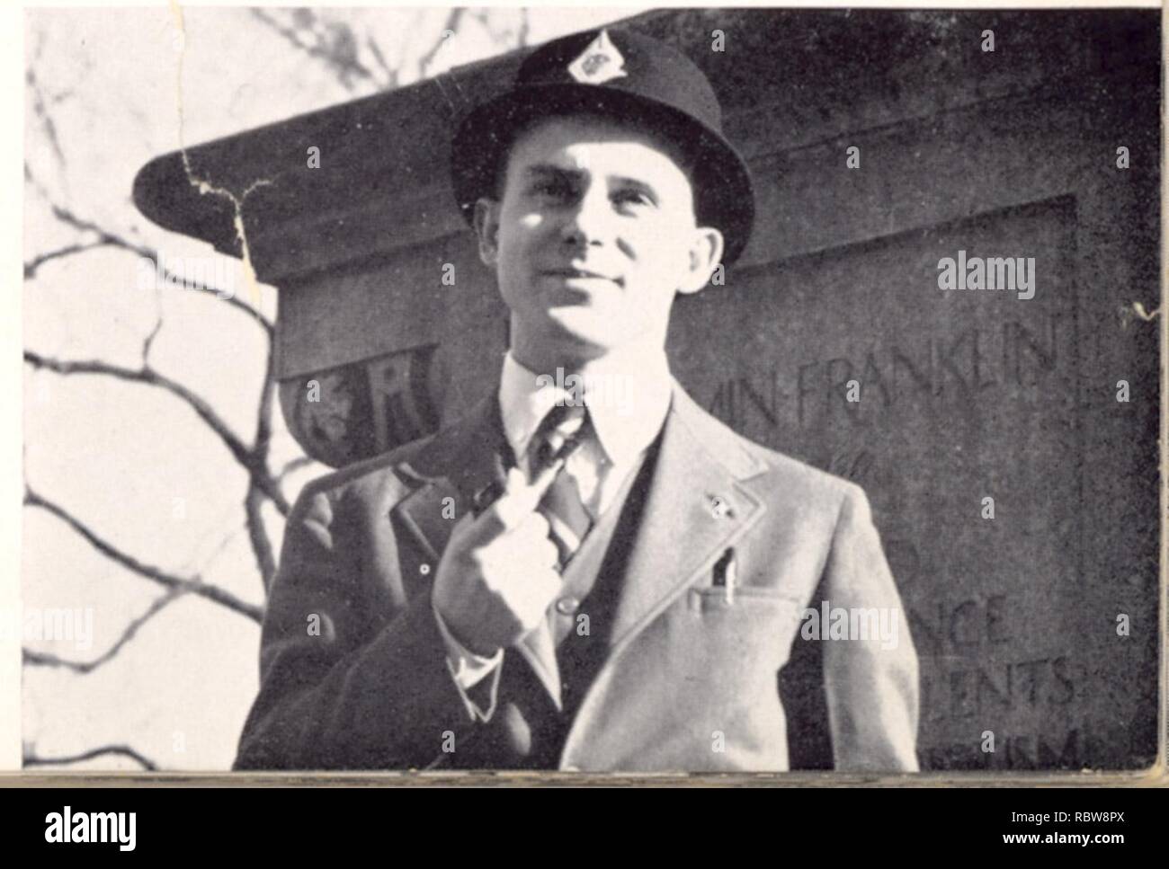 A Friar Senior Society member wearing the Friar hat in front of ...