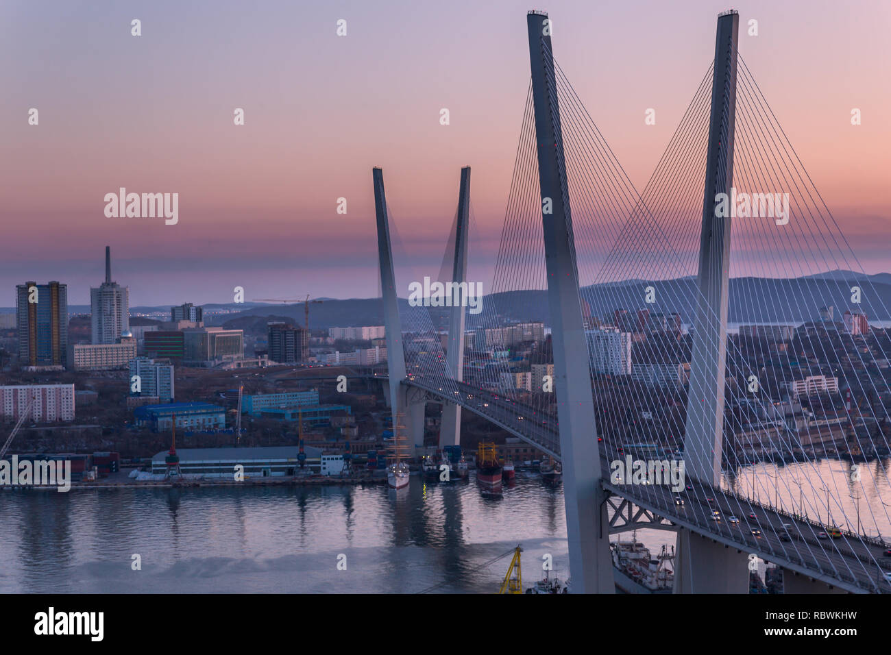 Golden bridge and Golden Horn bay at sunset, Vladivostok, Russia Stock ...