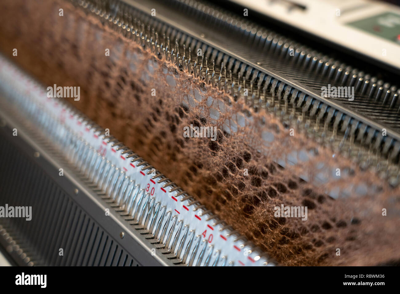 Mechanical knitting machine hi-res stock photography and images - Alamy