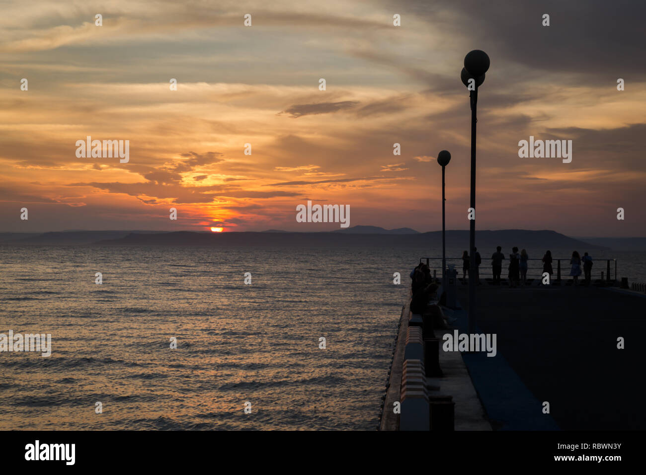 Colorful cloudy sunset beach hi-res stock photography and images - Alamy
