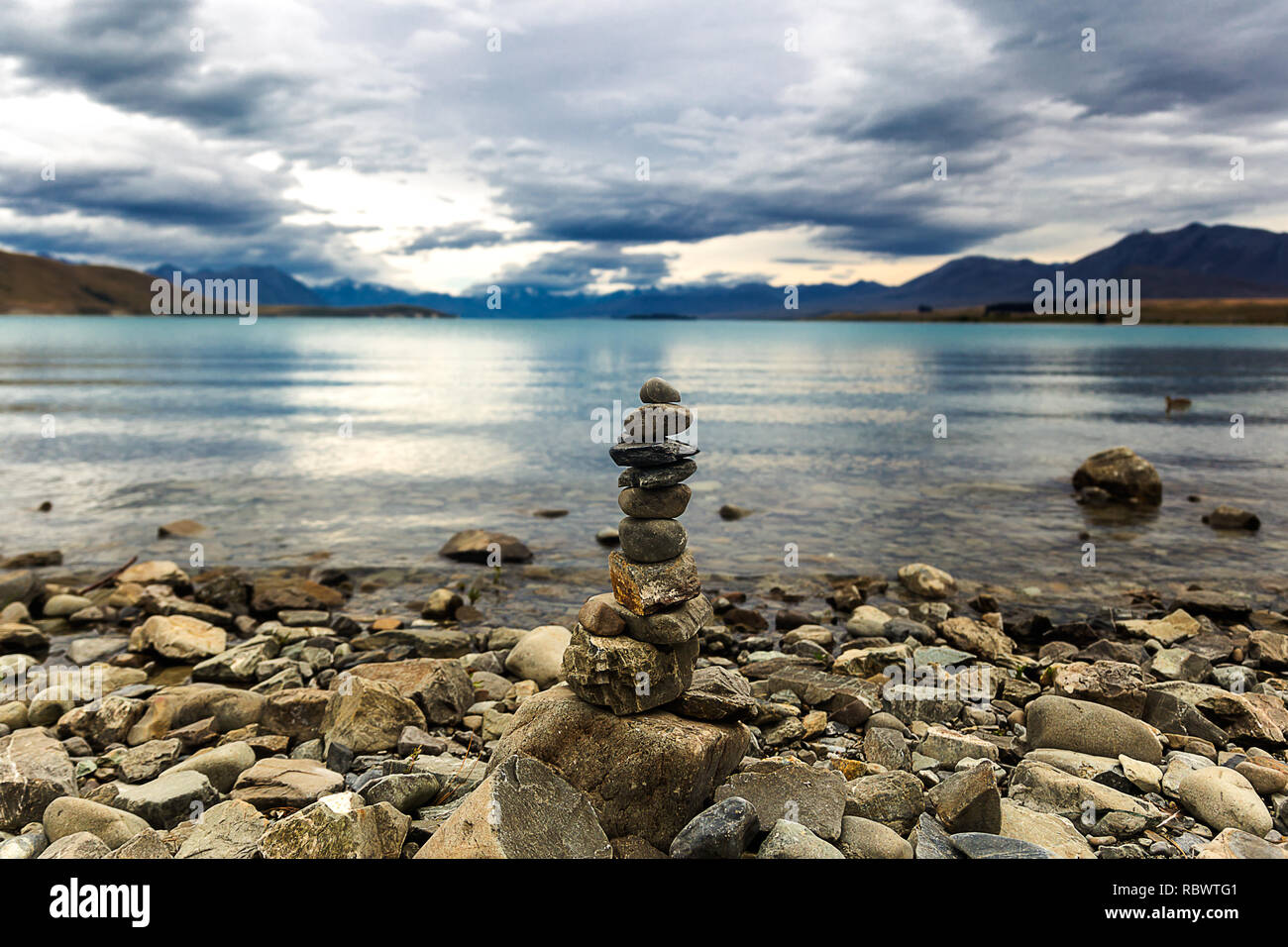 Stone pyramid on the shore of lake Tekapo, South Island, New Zealand ...