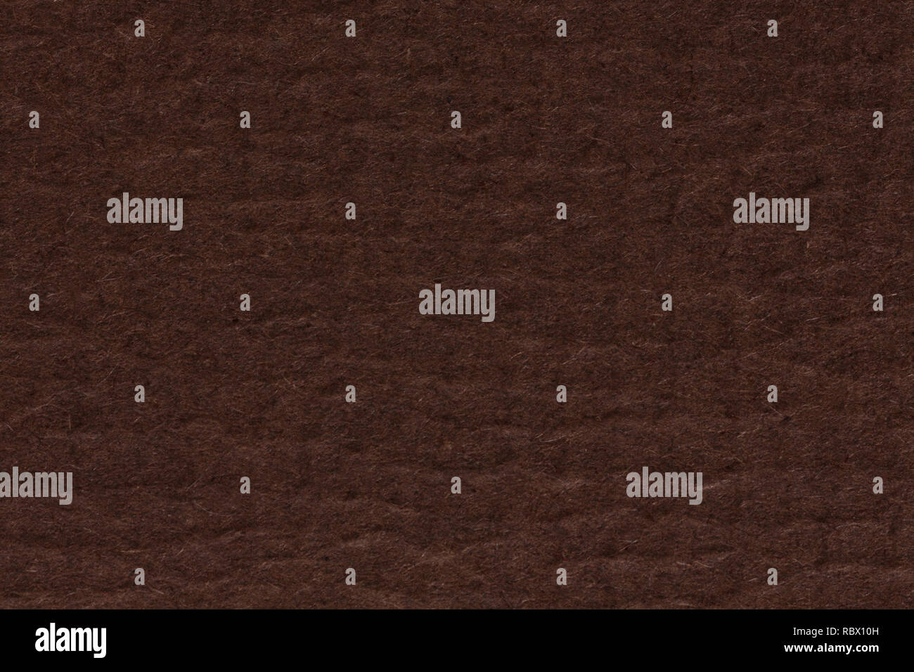 Photograph of artist's coarse grain dark brown pastel paper texture ...