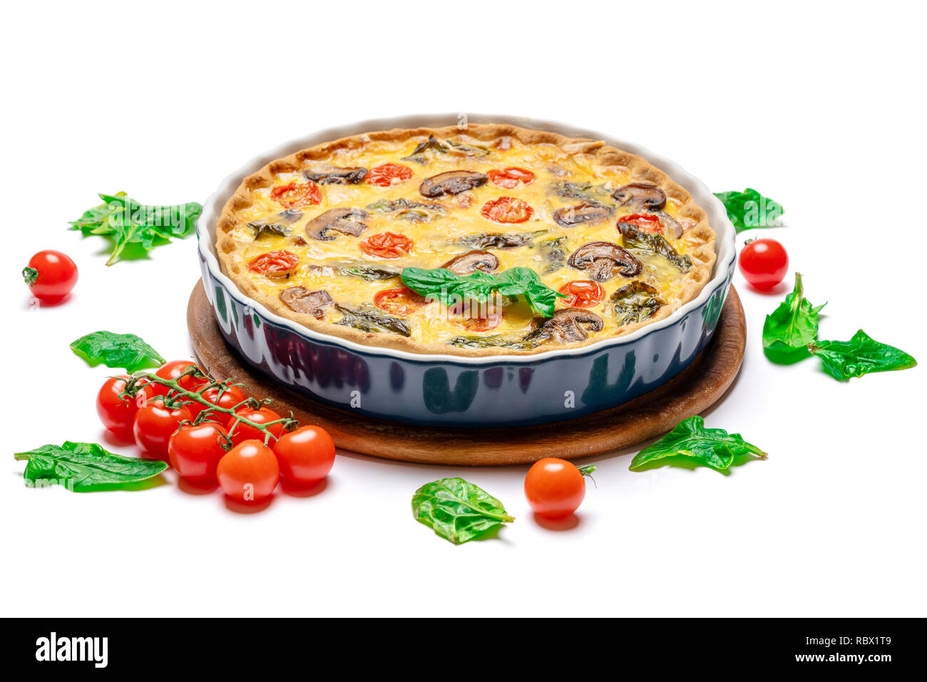 Baked homemade quiche pie in ceramic baking form Stock Photo - Alamy