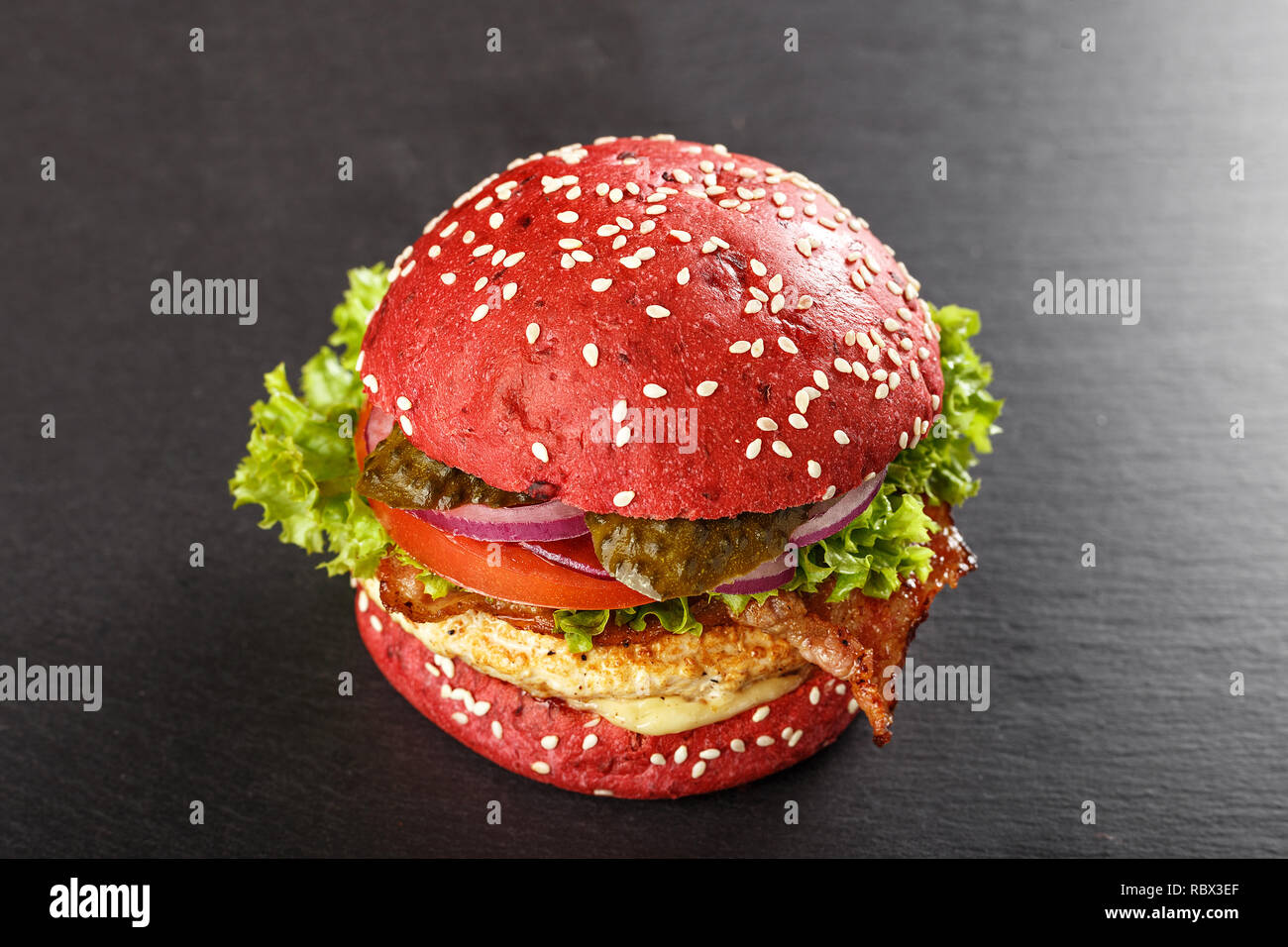 Colored red burgers. Homemade American chicken burgers hamburgers ...