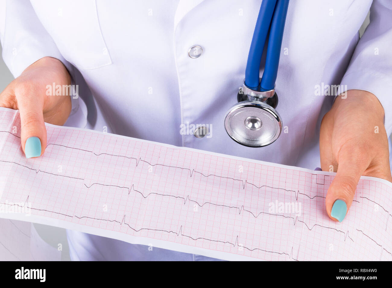 Electrocardiogram, ecg in hand of a female doctor. Medical health care ...