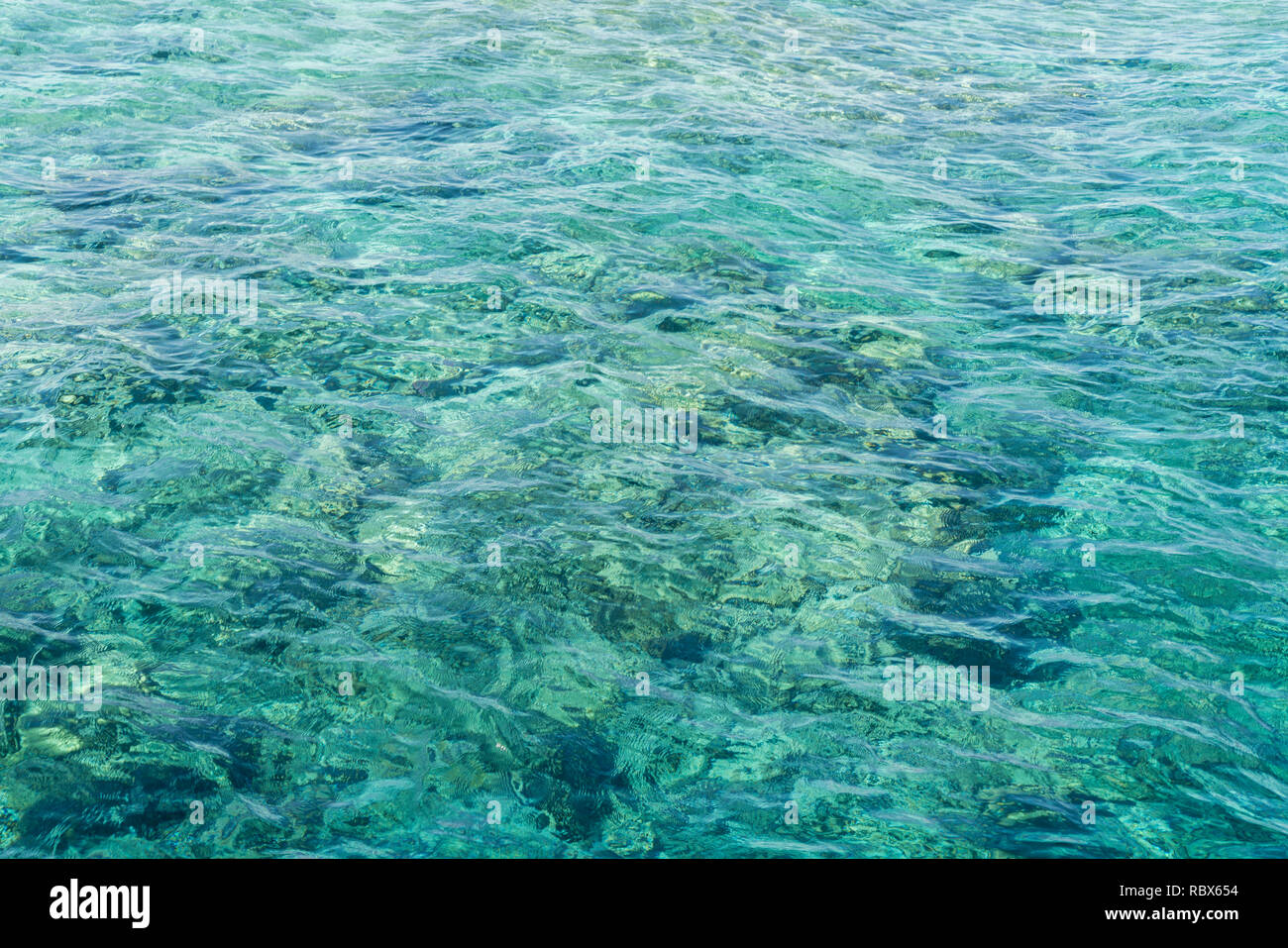 Blue sea background. Blue sea surface with waves Stock Photo - Alamy