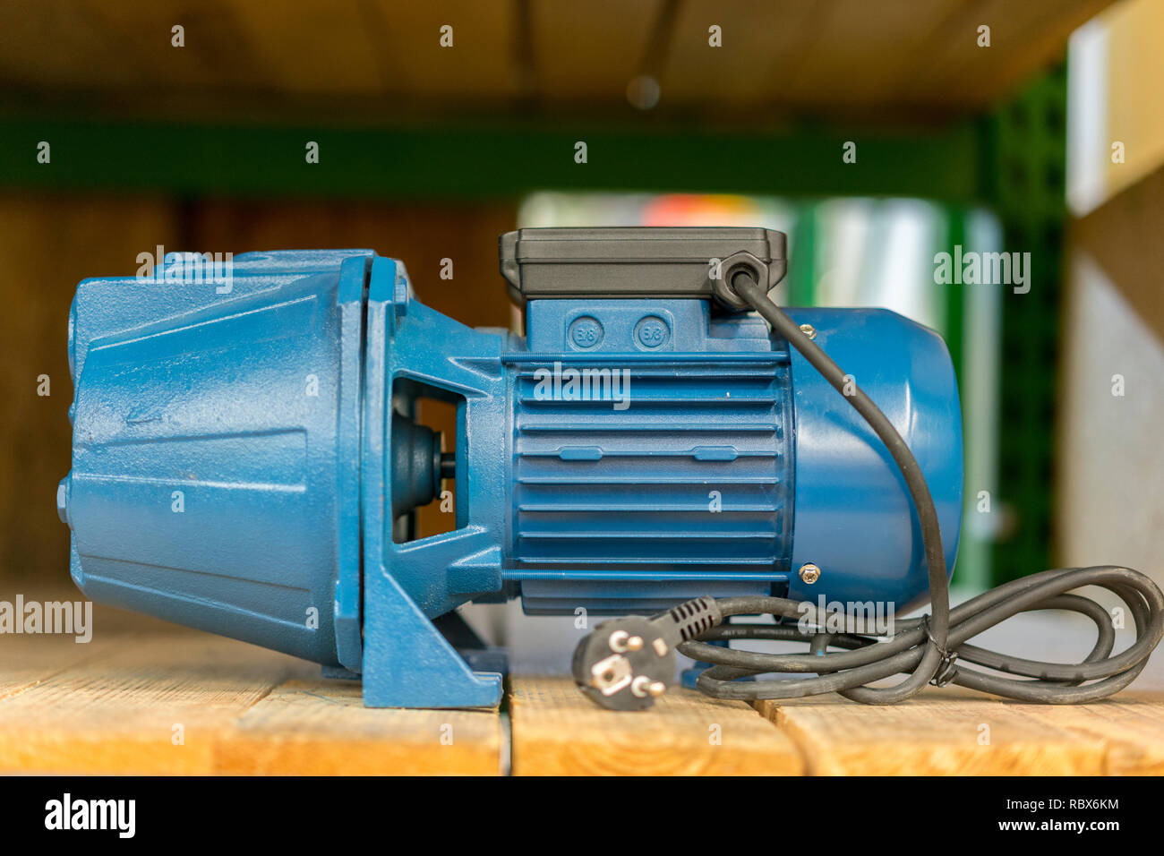 electric pump on the shelf in the store. Close up high technology water ...