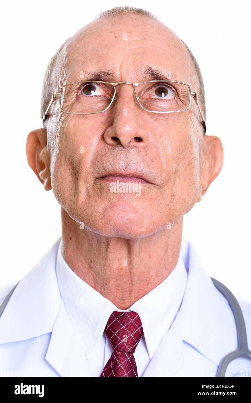 Face of senior man doctor thinking isolated against white background ...