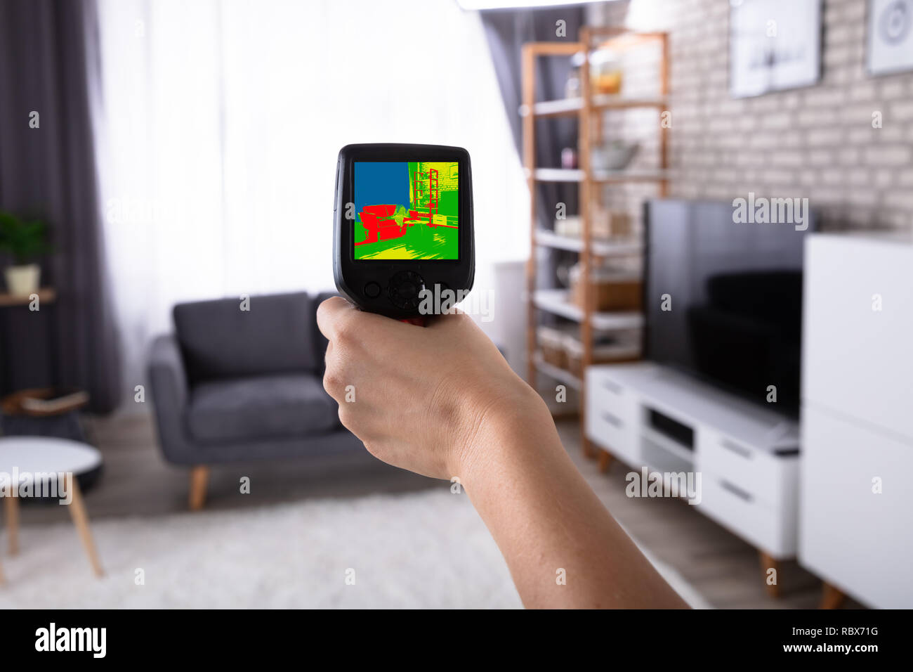 Woman's Hand Using Infrared Thermal Camera To Check Temperature In ...