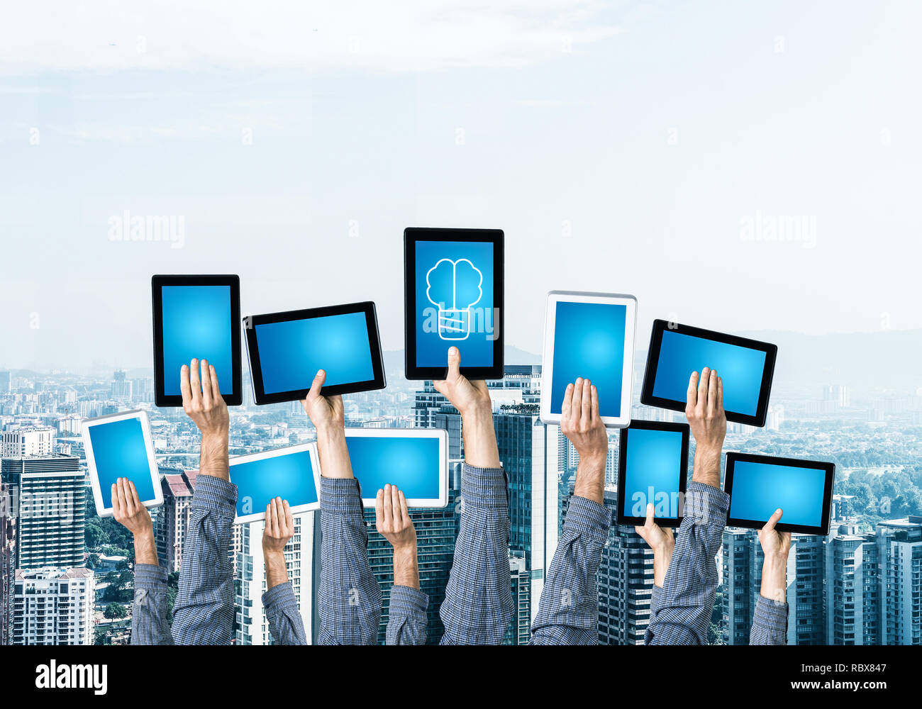 Close of man hands in line showing tablet pc with blank blue scr Stock ...