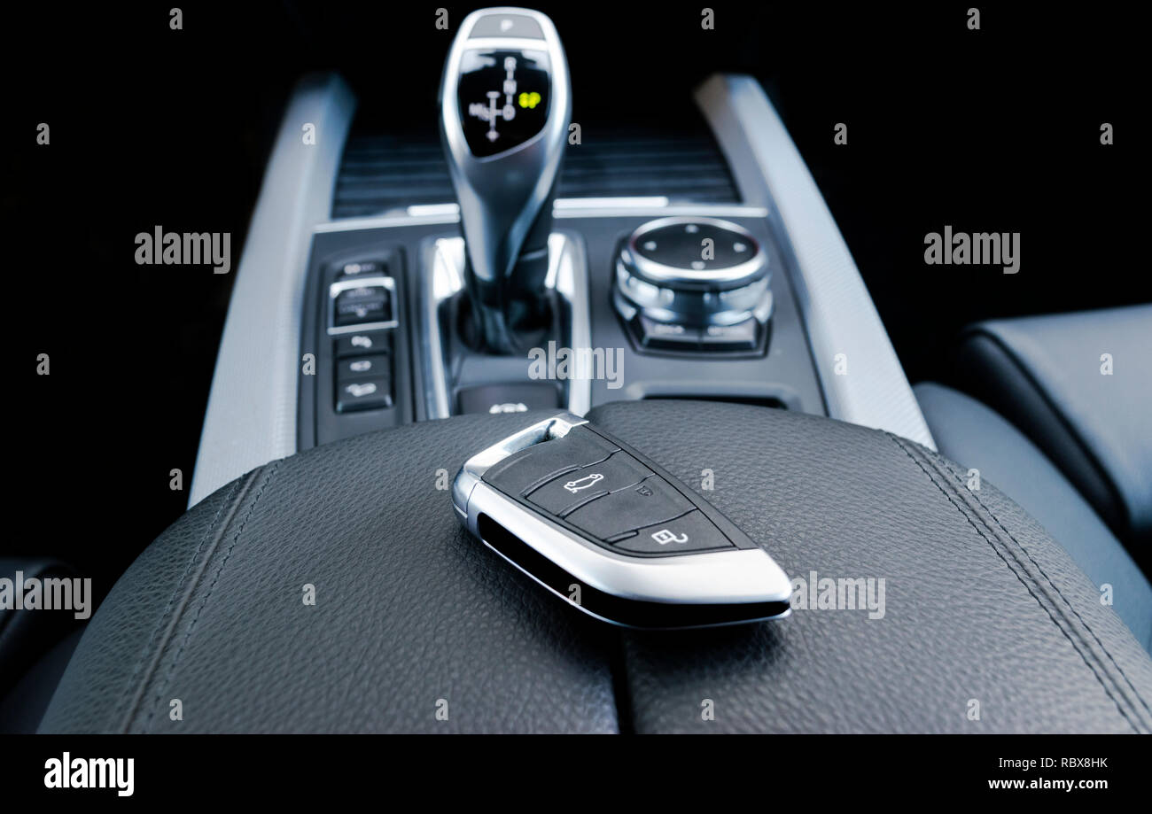 Closeup inside vehicle of wireless key ignition. Start engine key. Car ...