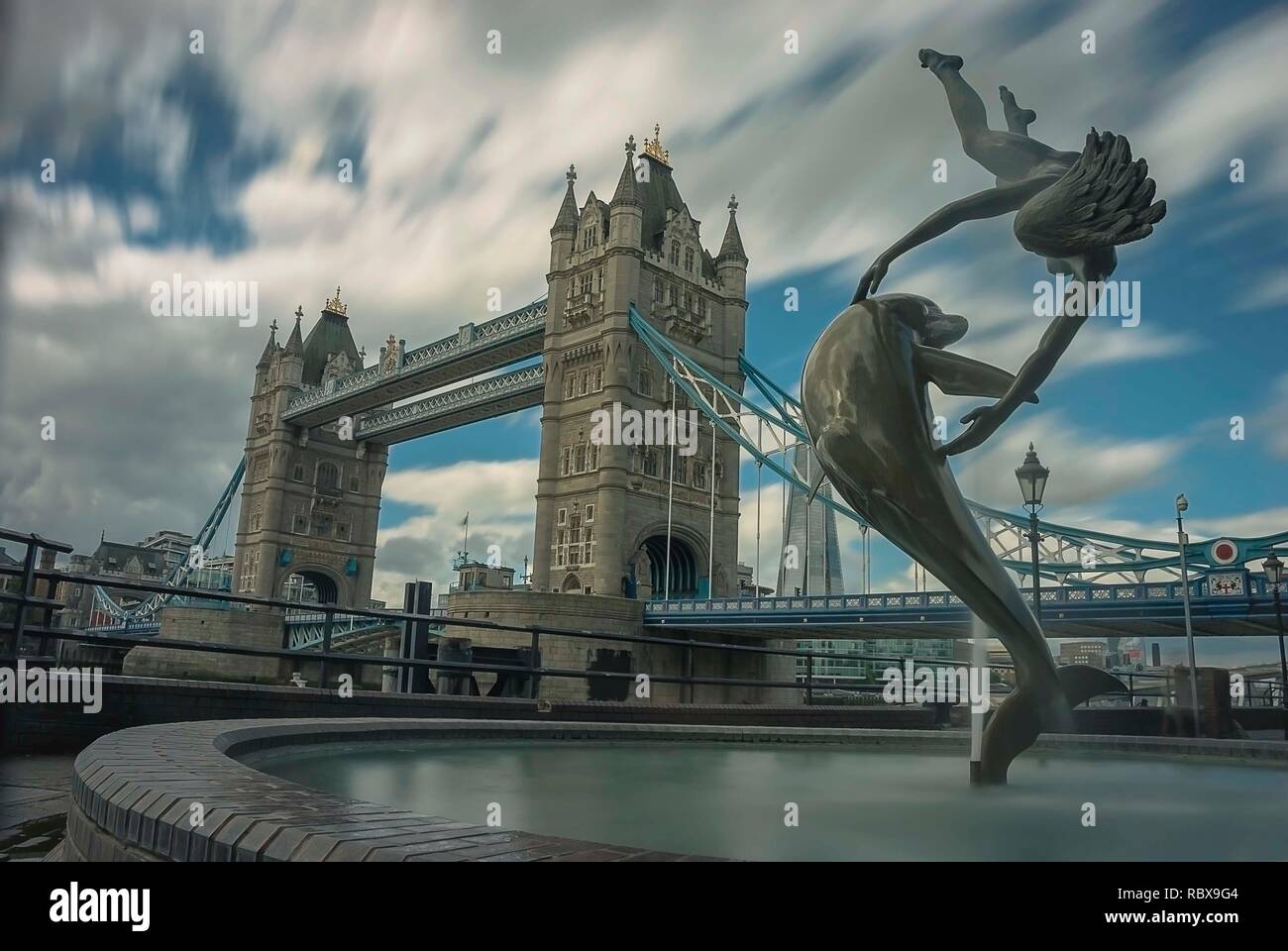 The Dolphin and Girl statue near Tower Bridge, London Stock Photo - Alamy