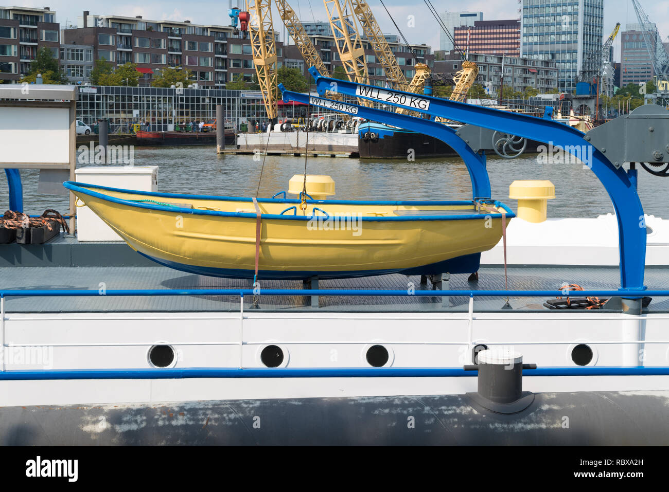 life boat hanging on a passengers ship in the Rotterdam harbor Stock ...