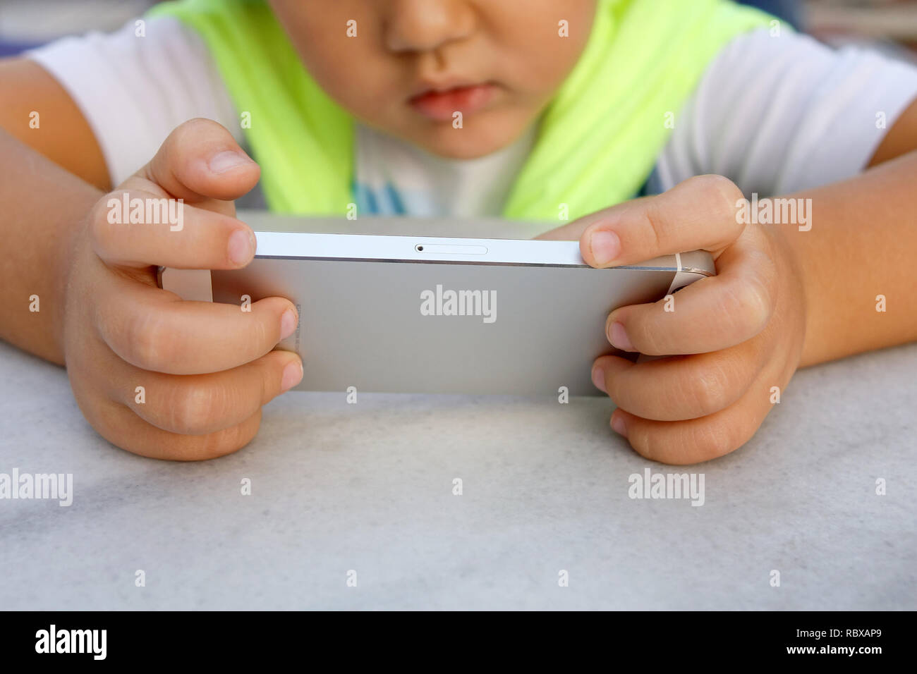Children playing electronic games hi-res stock photography and images ...