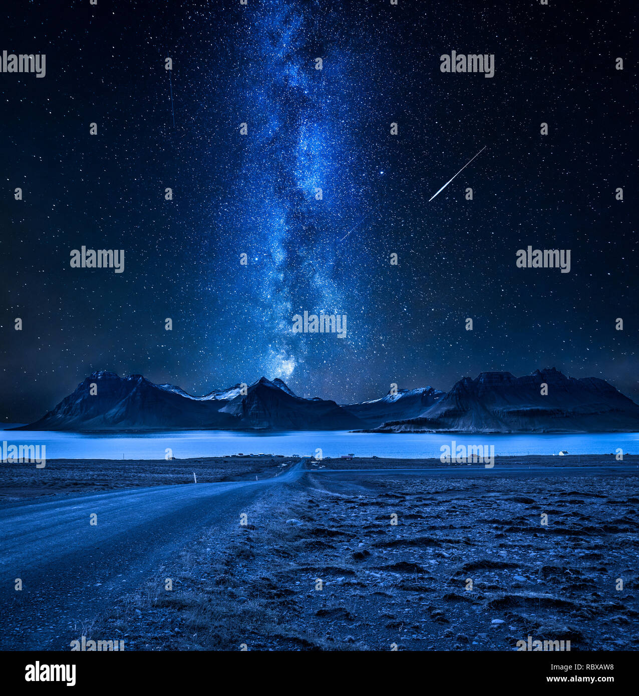 Mountain peaks, fjords and milky way in Iceland at night Stock Photo ...