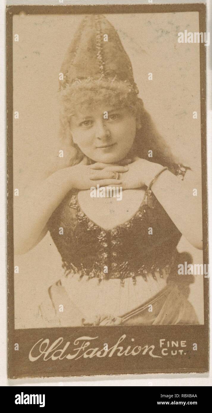 710097 Actress wearing pointed cap, from the Actresses series (N664 ...