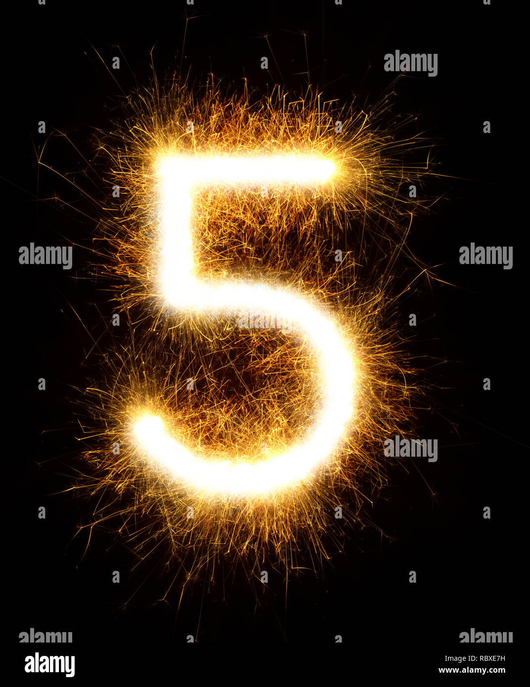 Number 5 drawn with spaklers on a black background Stock Photo - Alamy
