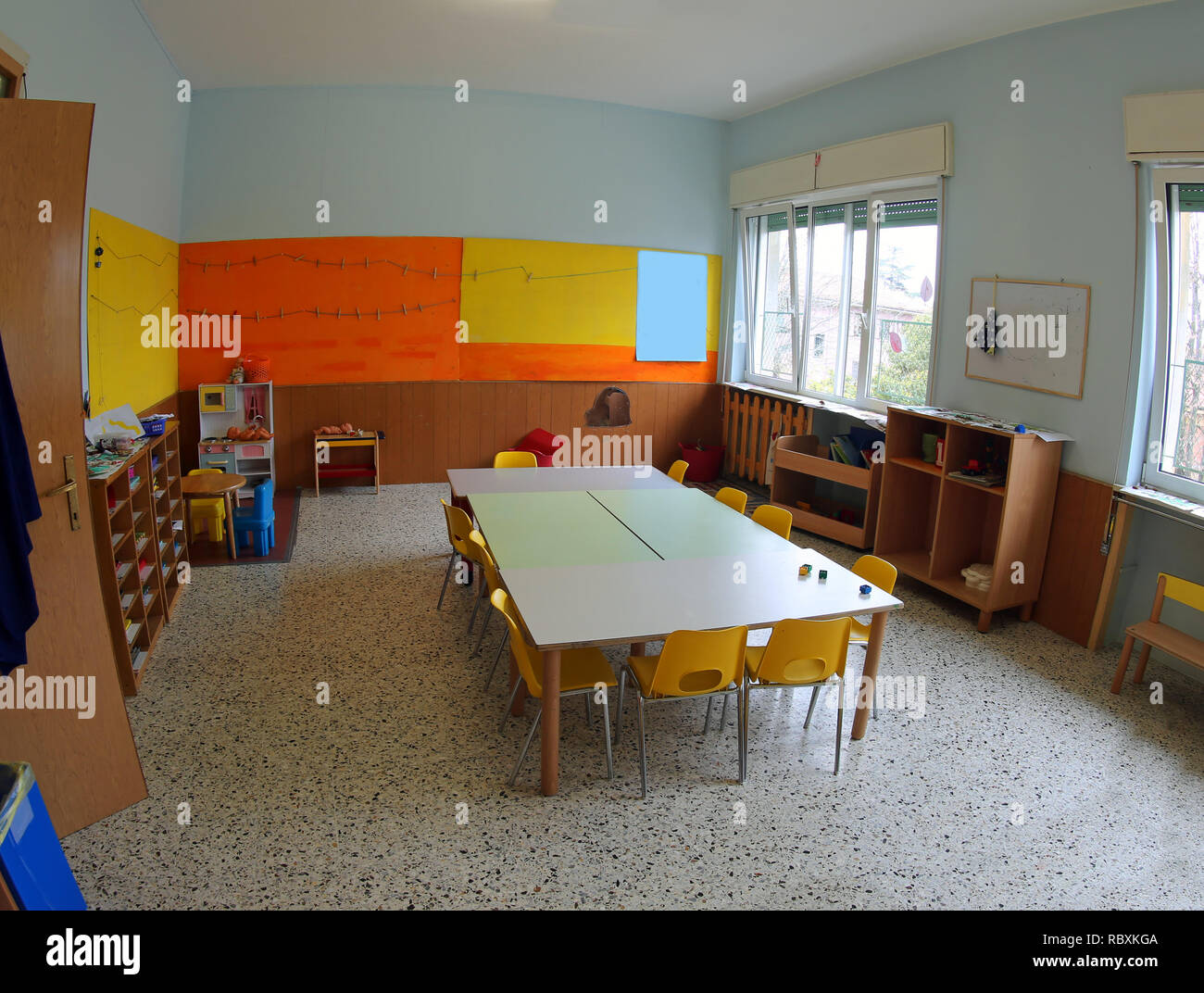 inside the school class of a school with small tables without the ...